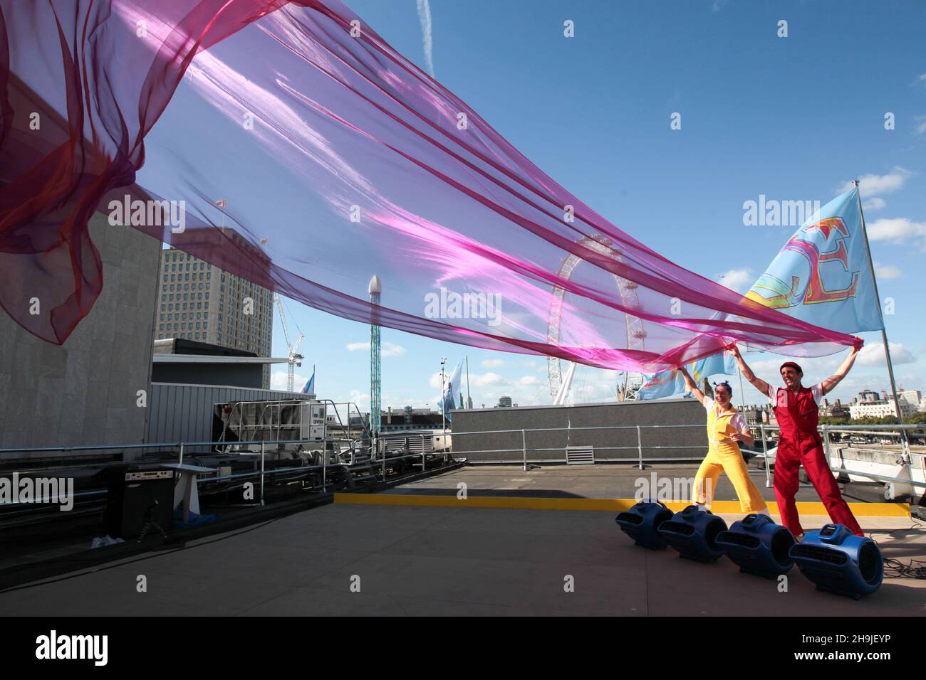 New York clown duo Acrobuffos performing part of Air Play, on the roof ...