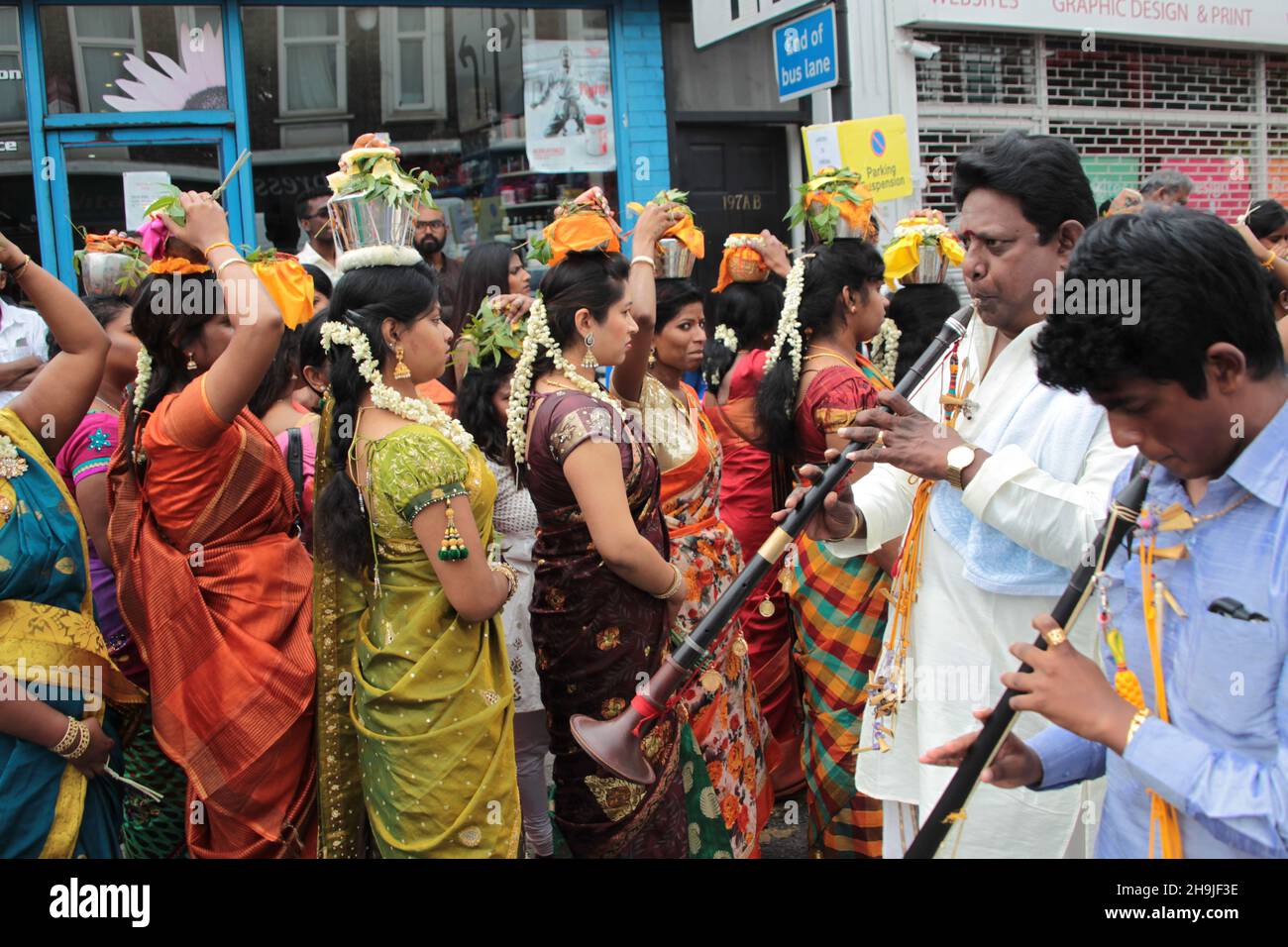 Musicians performing during a chariot procession which is the ...
