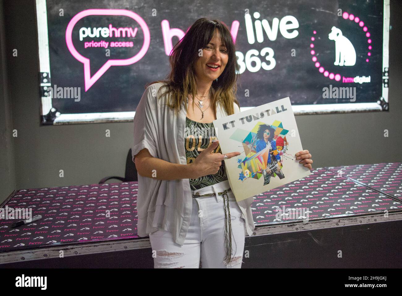 KT Tunstall posing with her new album Kin after a special gig for fans ...