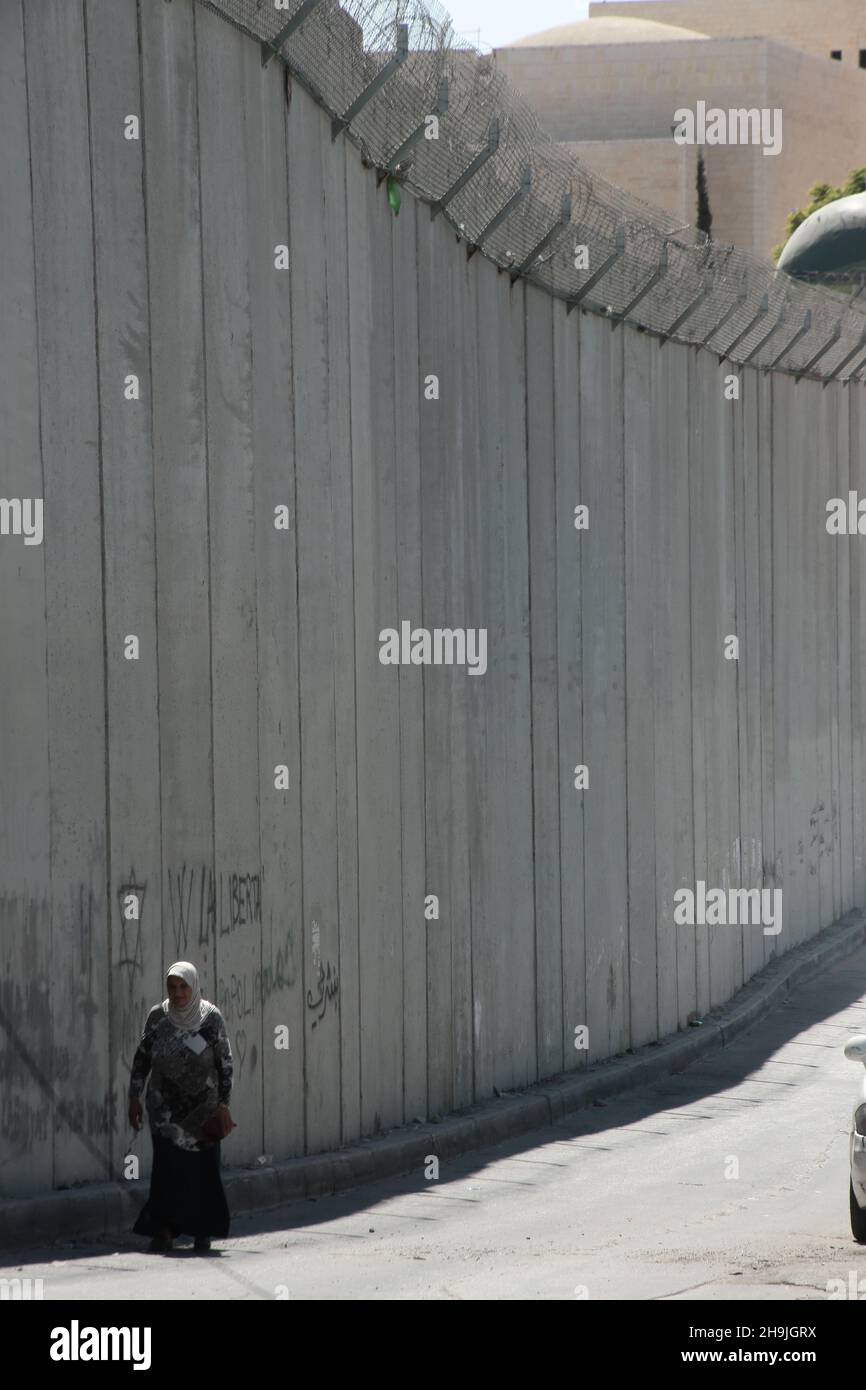 A view of the wall of separation in East Jerusalem. From a series of ...