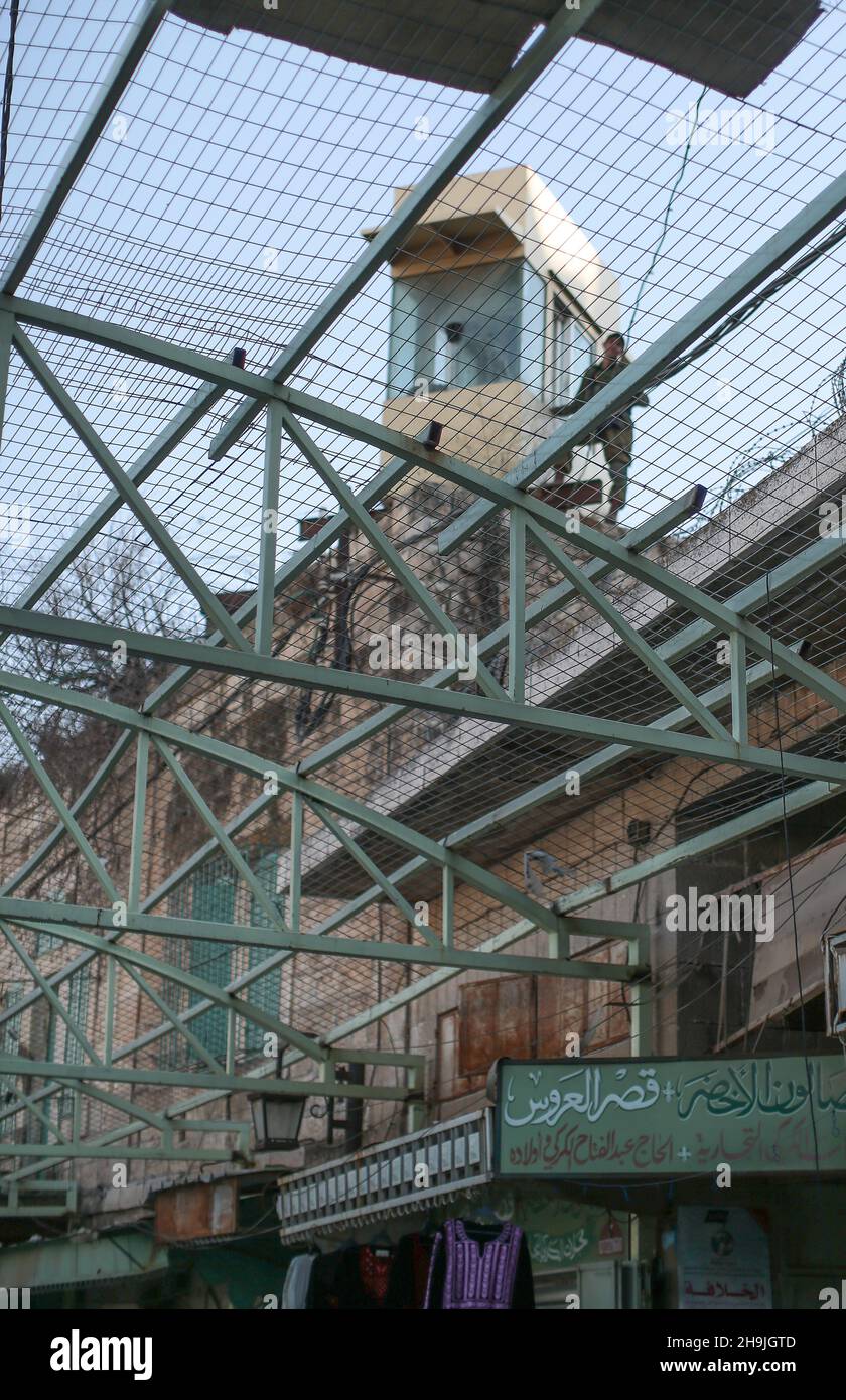 A view of a watch tower above a Palestinian area of the old town of ...