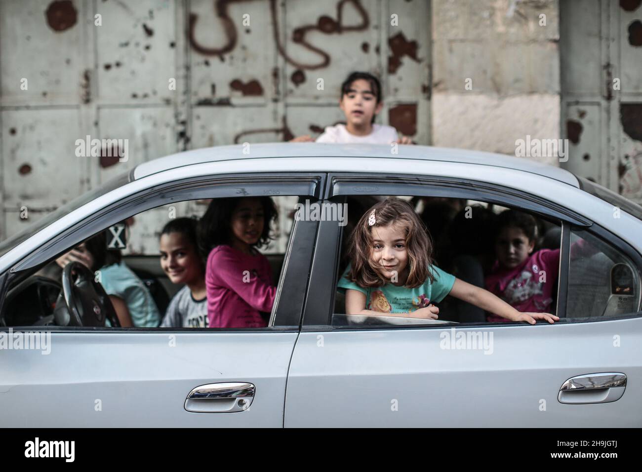 Children in a car in Hebron. From a series of photos commissioned by ...