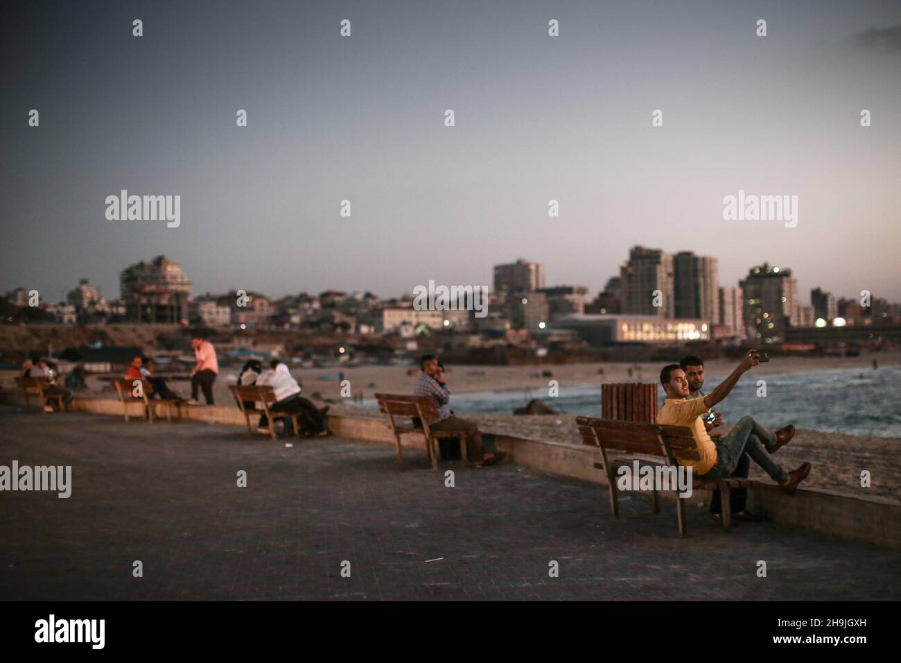 A view of the sea front at dusk in Gaza City. From a series of photos ...