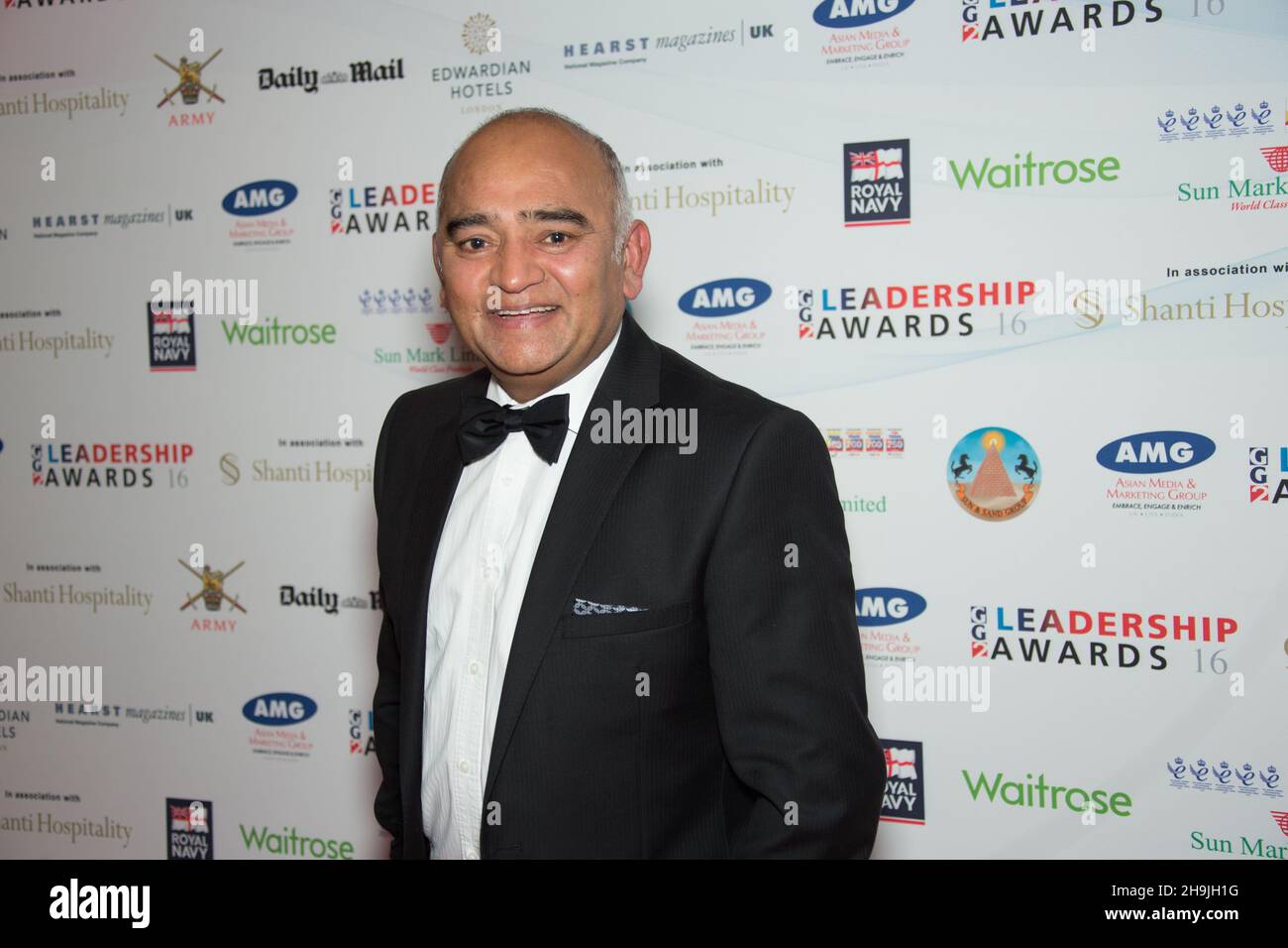 Bhasker Patel posing for photos before the 2016 GG2 Leadership Awards ...