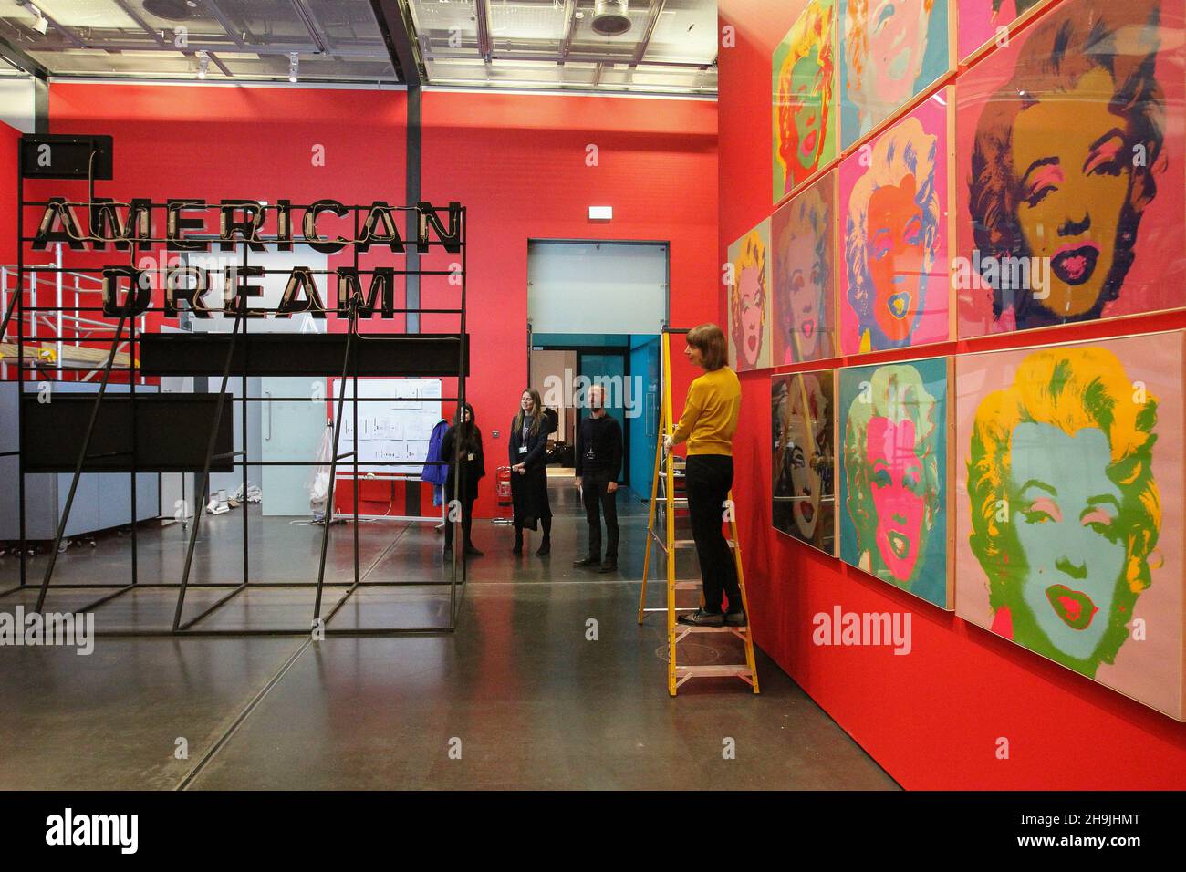 Project curator Catherine Daunt checks 10 "Marilyn" screenprints by ...