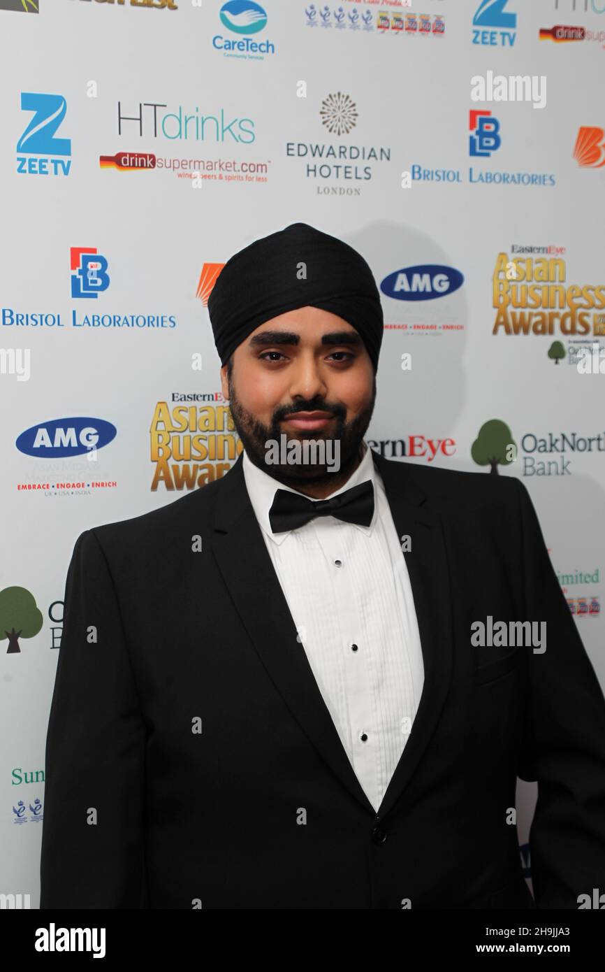 British Bake-Off contestant Rav Bansal posing for photos on the red ...