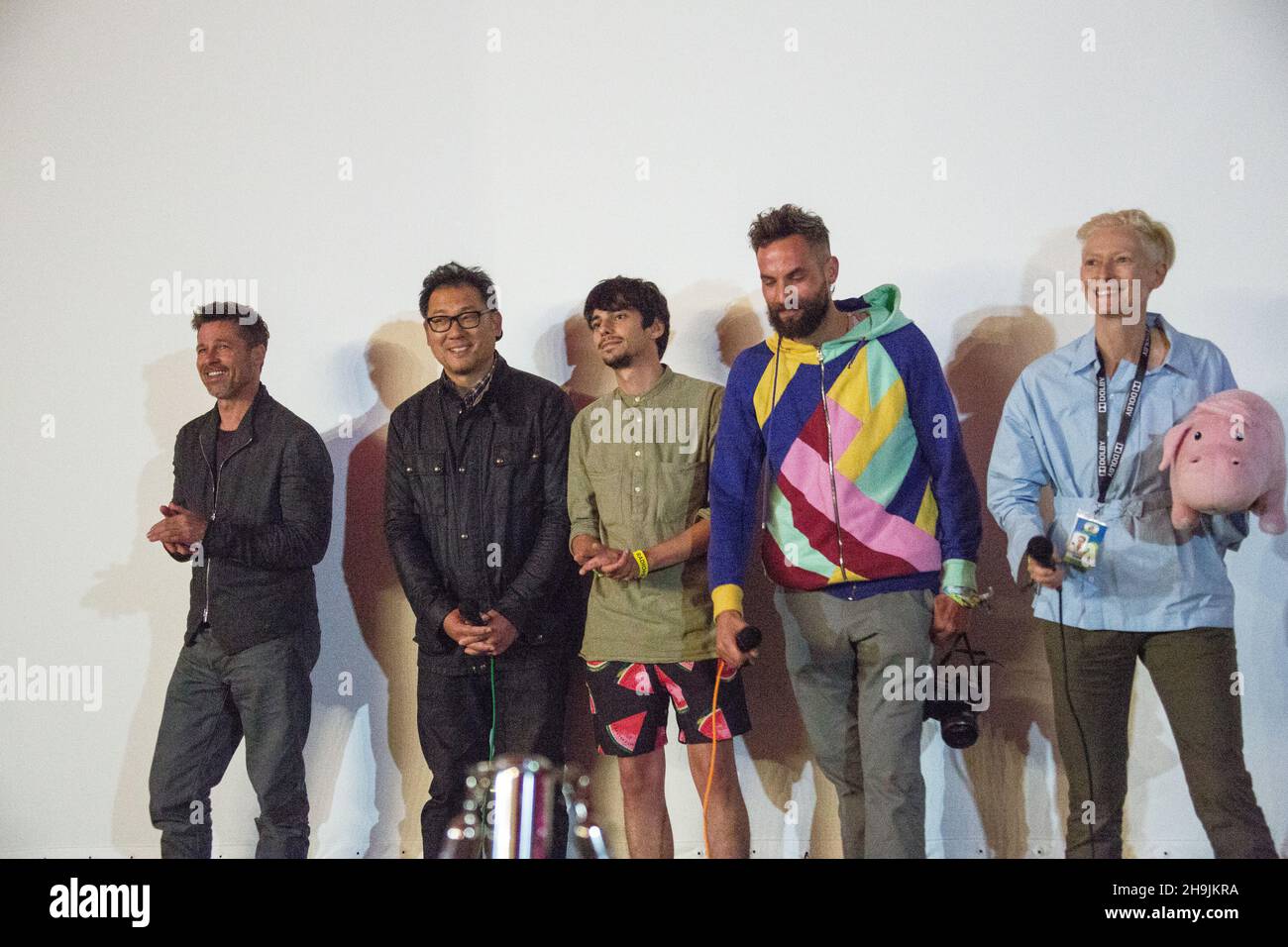 (left to right) Brad Pitt and Dooho Choi (co-producers) and member of ...