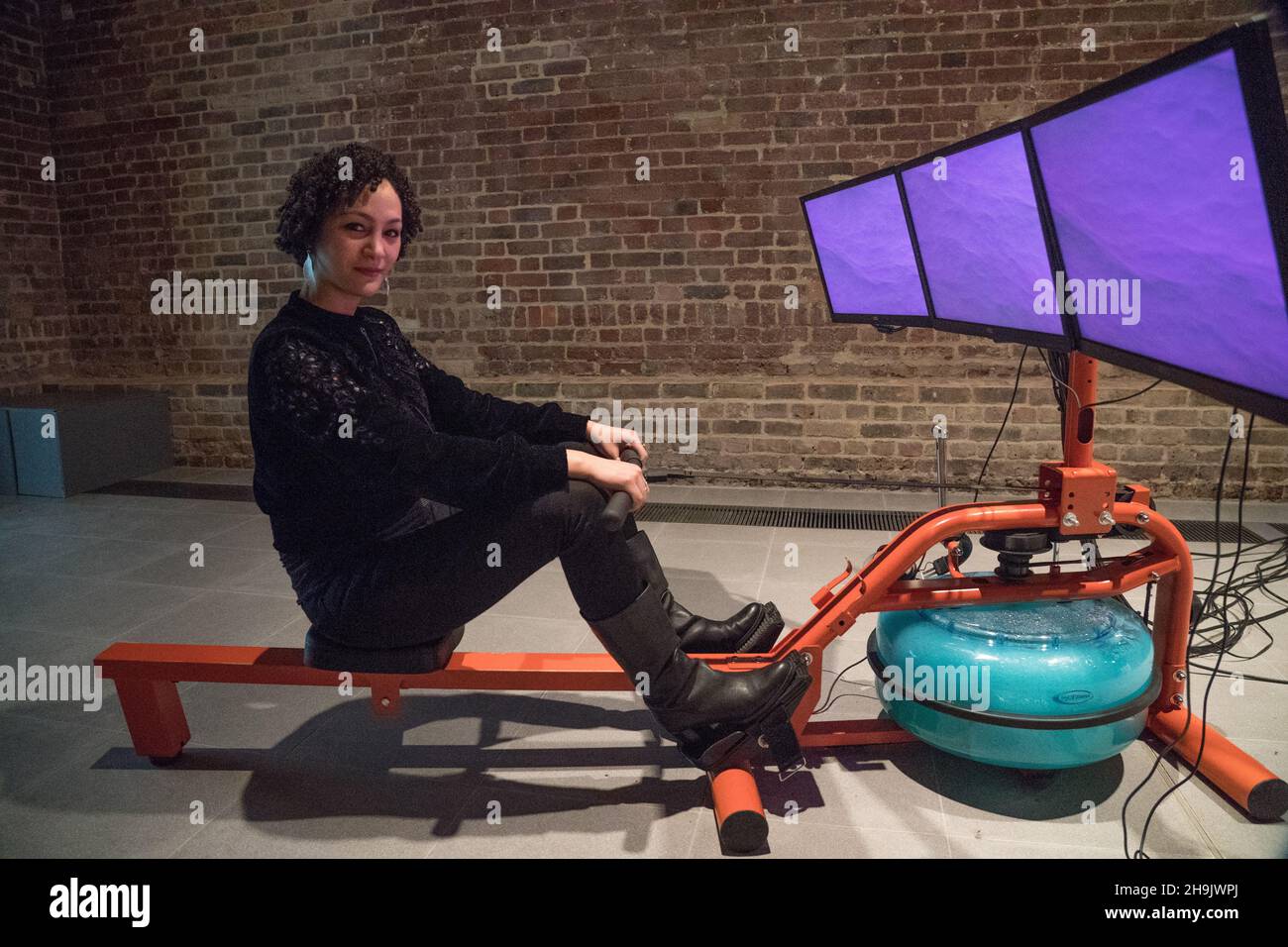 Exhibitions curator Amira Gad poses for photos at American video artist ...