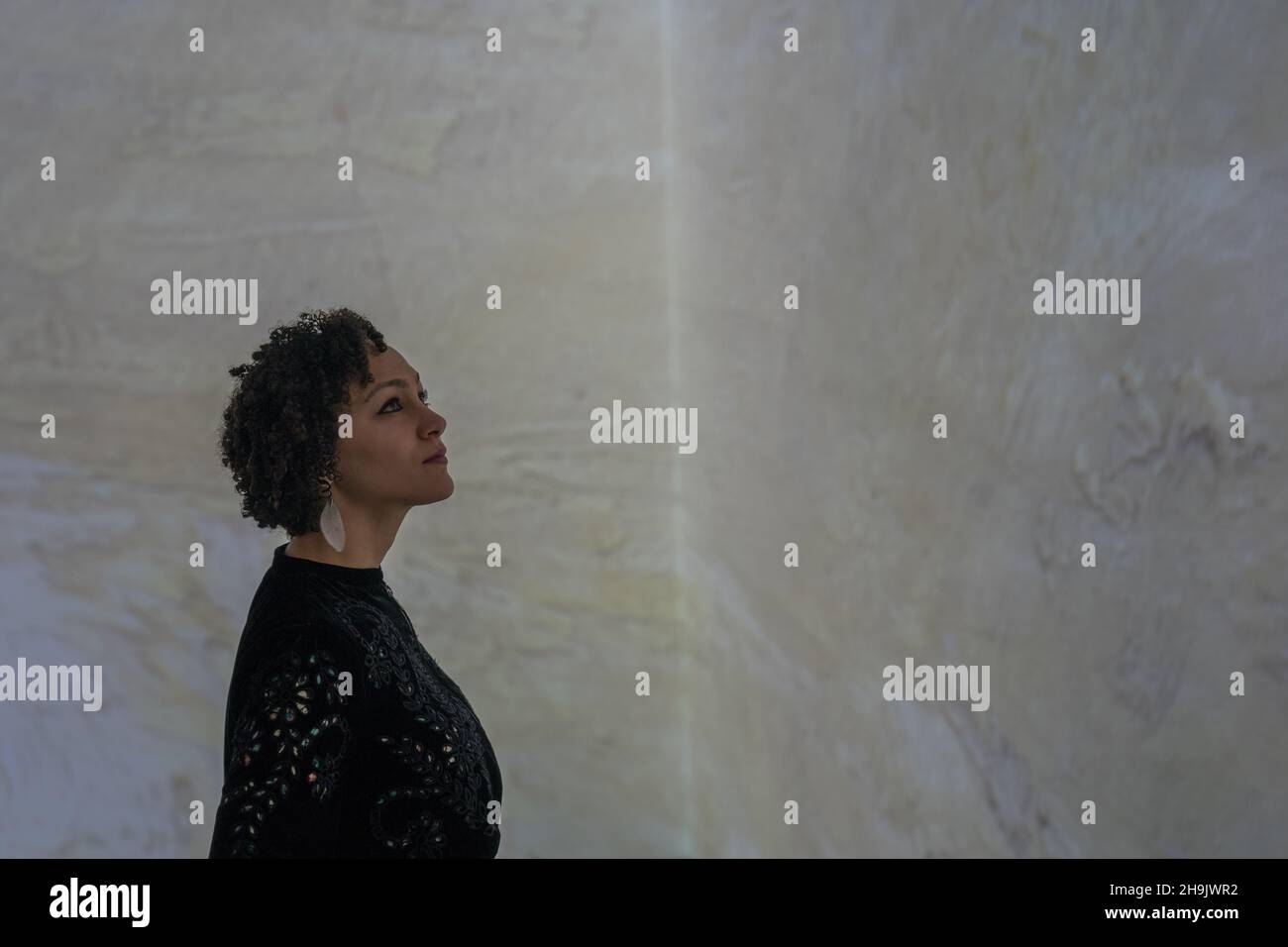 Exhibitions curator Amira Gad poses for photos at American video artist ...