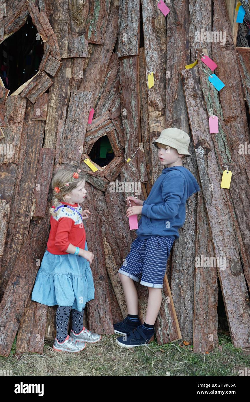 Children at the foot of the Green Man effigy at the 2018 Green Man ...