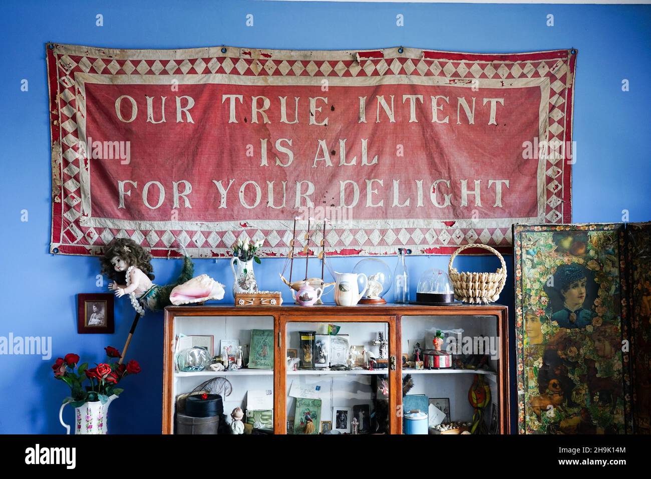 A banner saying Our True Intent is All For Your Delight (a quote from ...