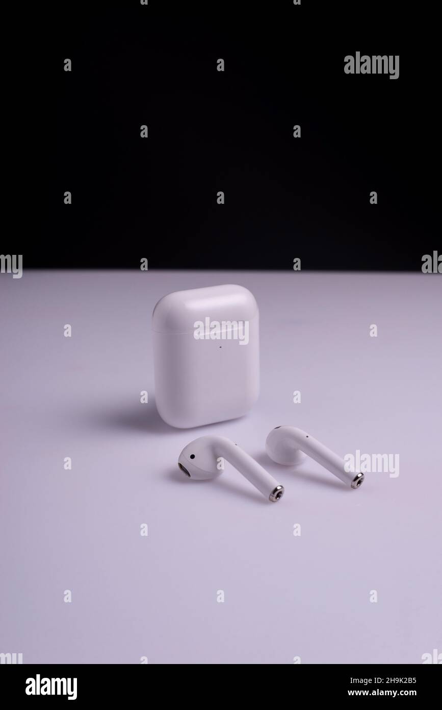 white wireless headphones in box on white background Stock Photo - Alamy