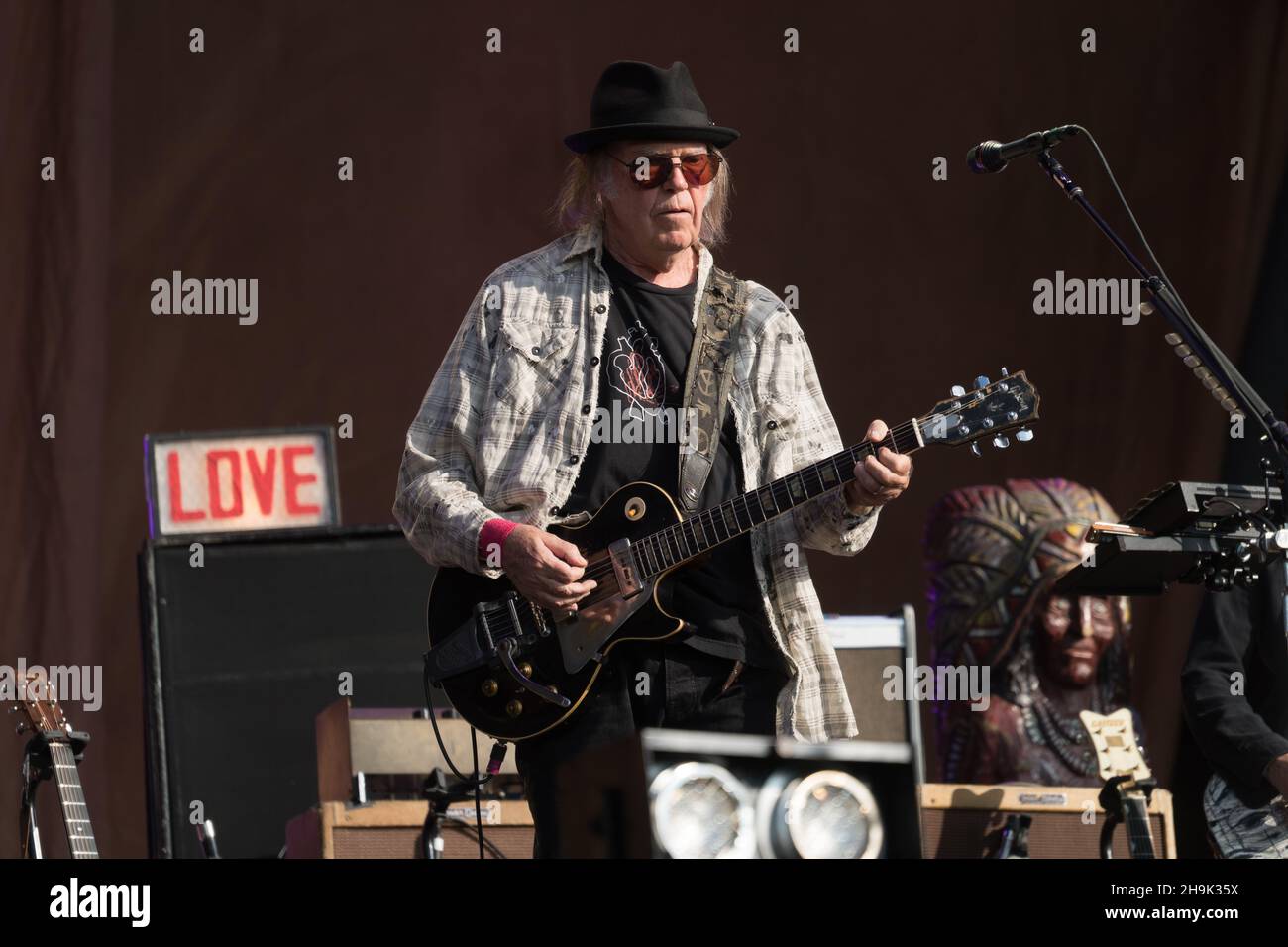 Neil Young performing live on stage in Hyde Park in London. Photo date ...