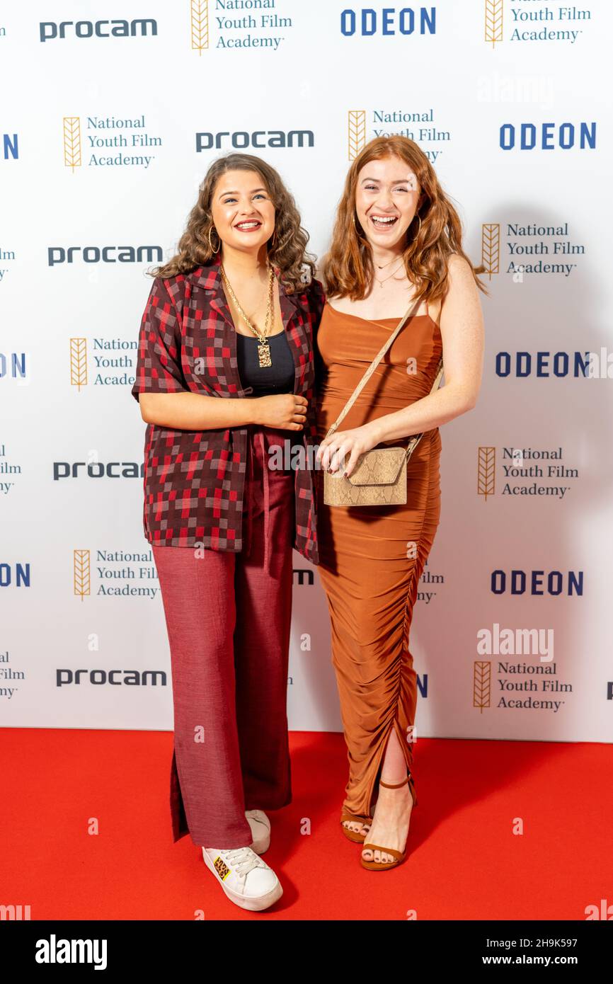 Abby Russell (left) and Lara Cooper Chadwick posing for photos on the ...