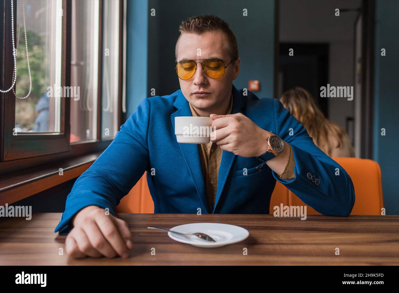 Handsome brooding businessman talking hi-res stock photography and ...