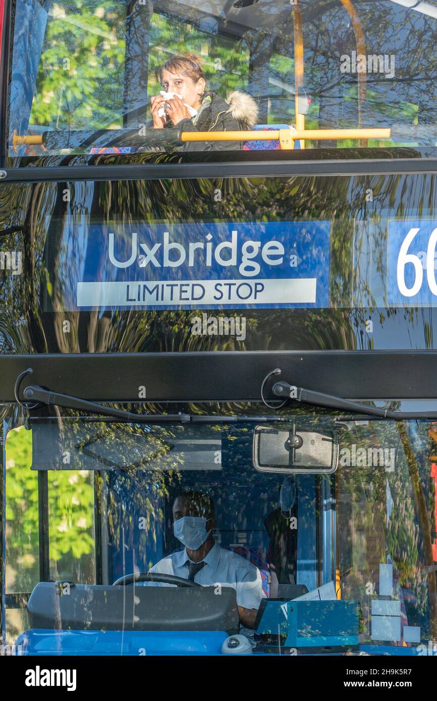 Blowing nose on bus hi-res stock photography and images - Alamy