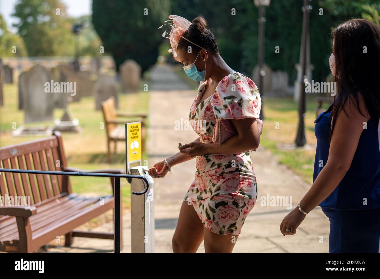 Guests sanitise their hands at the first wedding to be held at St ...