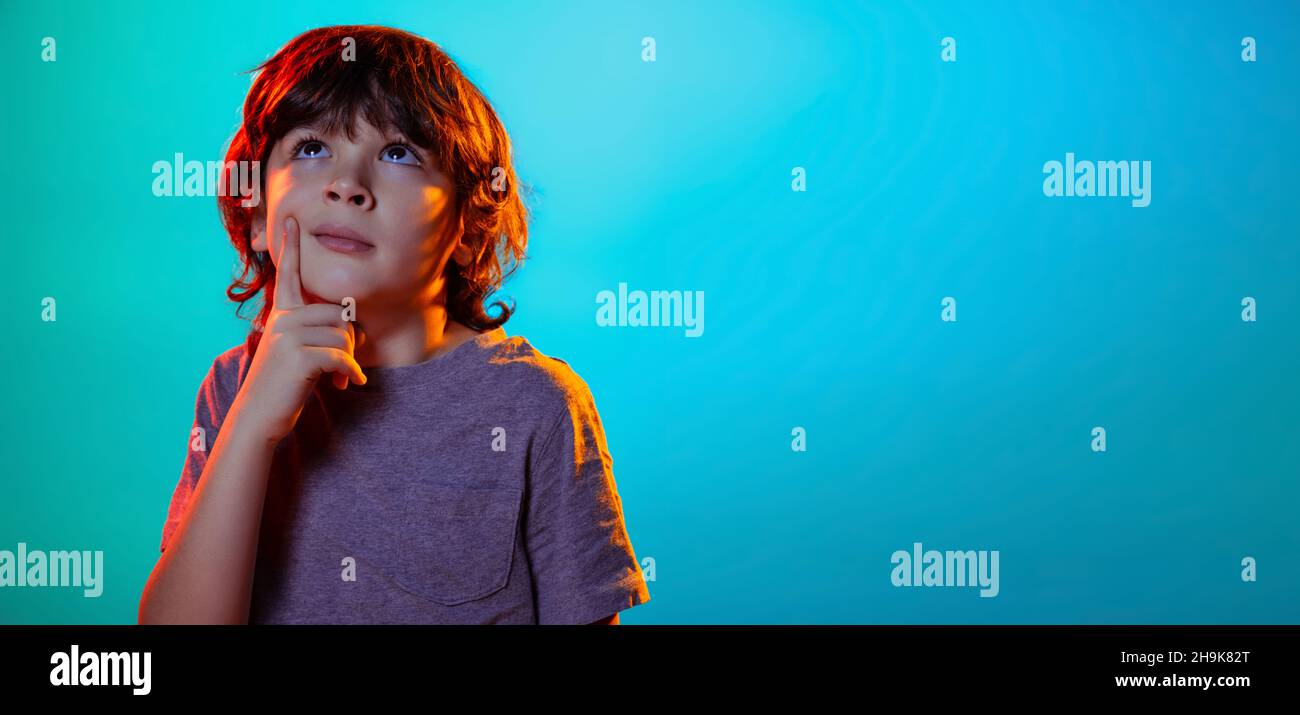 Flyer with portrait of little boy, kid raising finger up isolated on ...