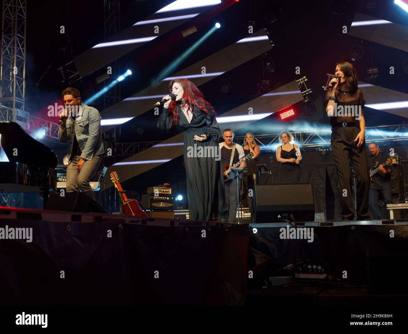 French Quebec singer Cassiopée (center) performs on stage in Montreal ...