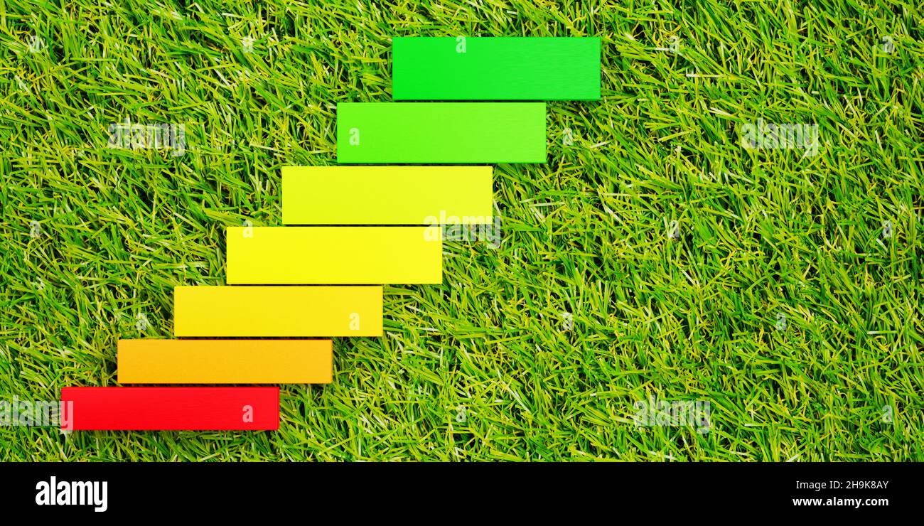 Abstract european energy classification label on grass background ...