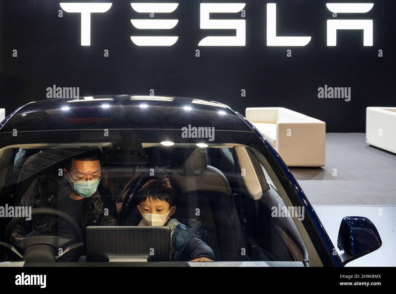 Hong Kong China 05th Dec 2021 Visitors Test And Sit In A Tesla