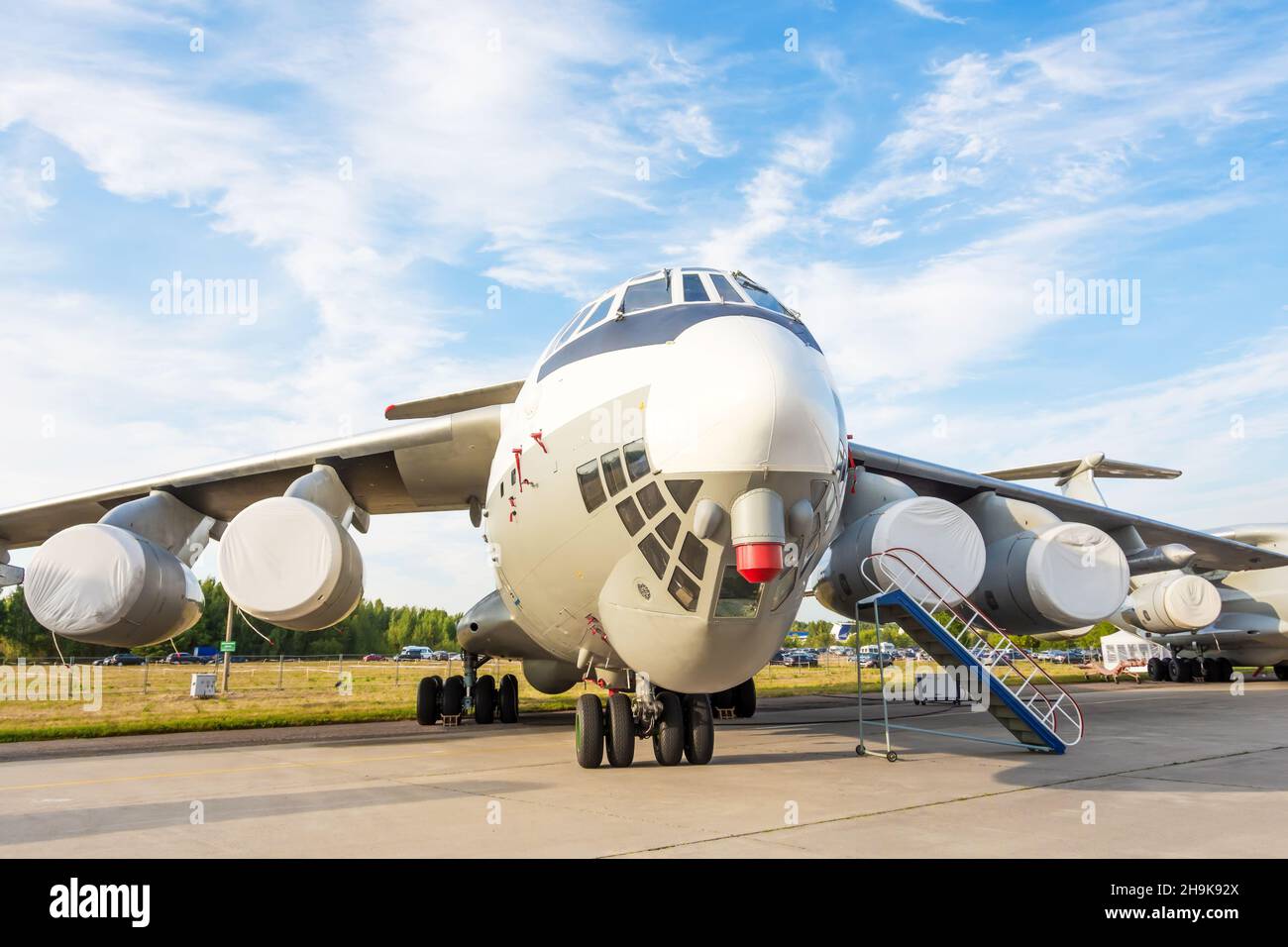 Heavy military transport aircraft at the airfield parking Stock Photo ...