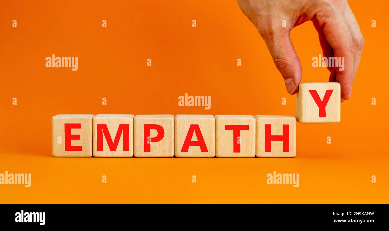 Empathy symbol. The concept word Empathy on wooden cubes. Beautiful ...