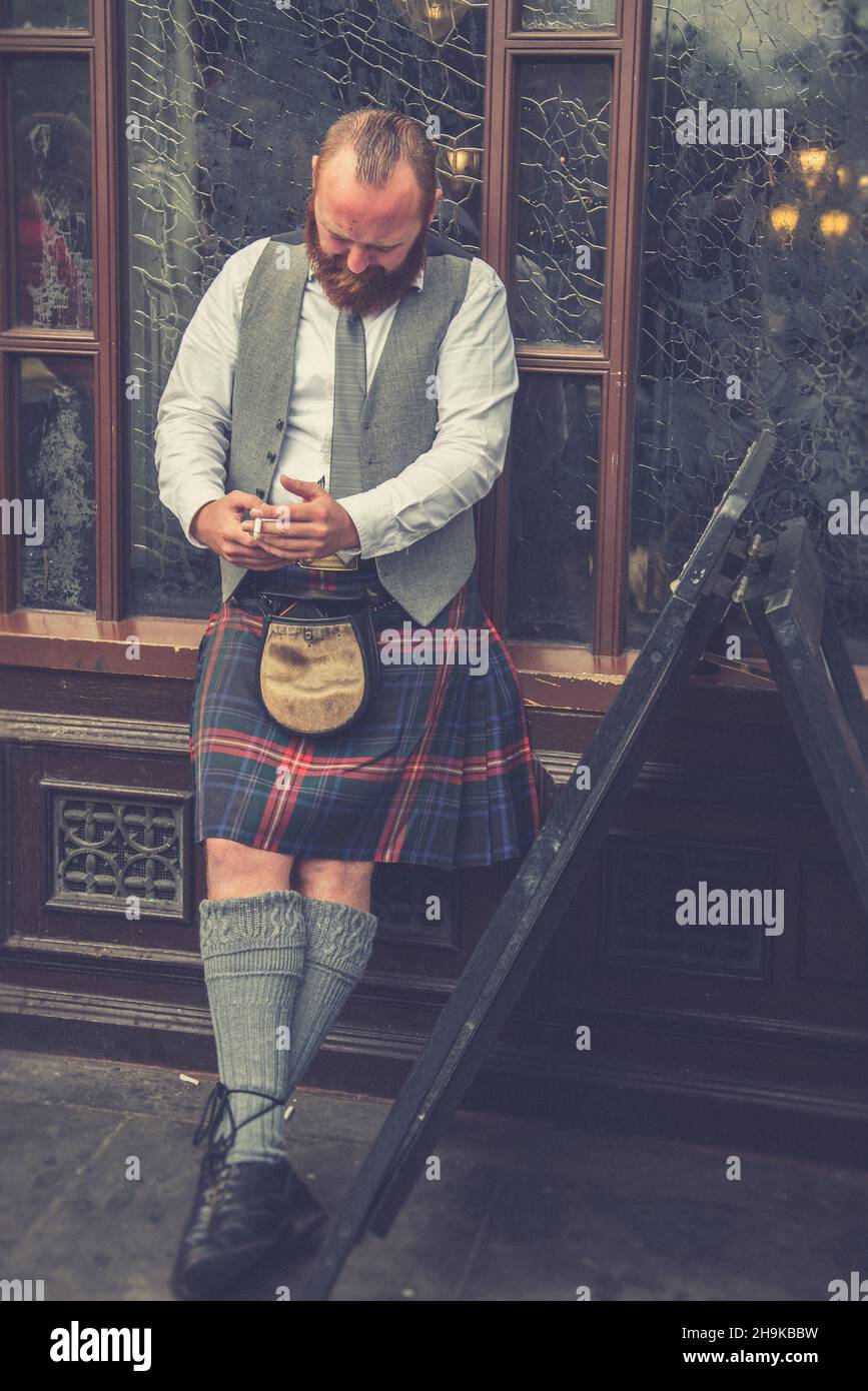 London, September 2021. Man in kilt, traditional Scottish Highland ...