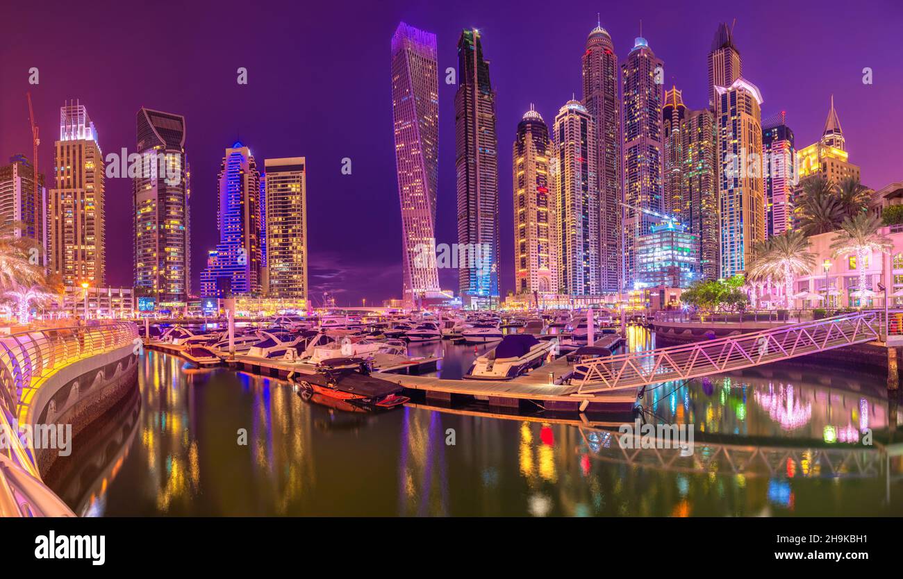 Dubai marina yachts day night hi-res stock photography and images - Alamy