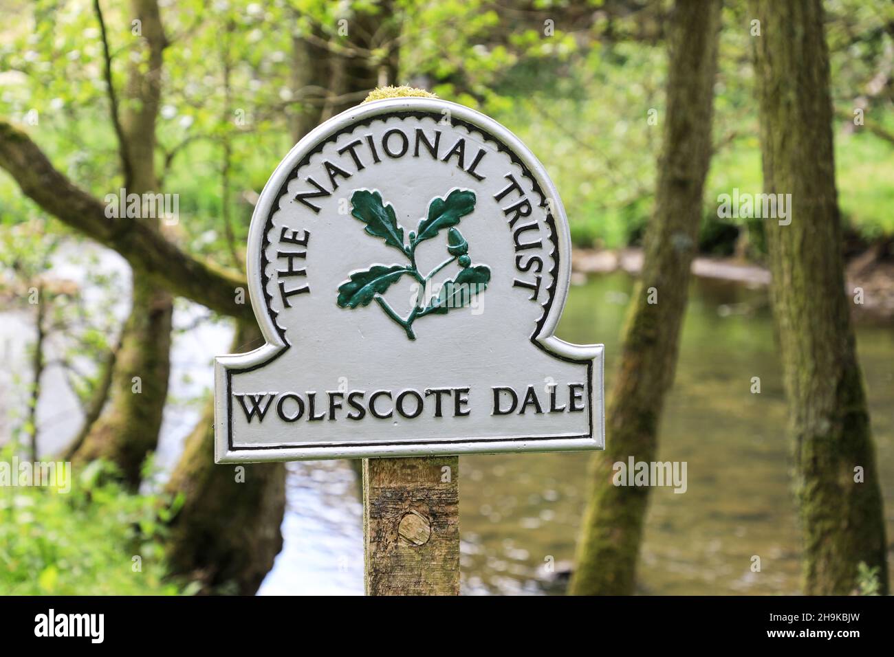 A National Trust omega sign at Wolfscote Dale in the Derbyshire and ...