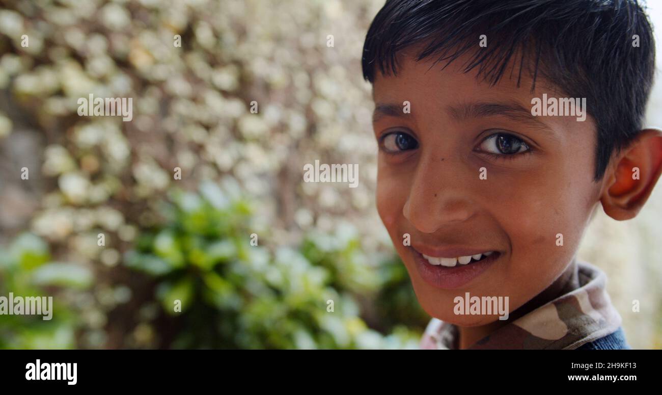 Shallow focus of a young Indian boy with a spontaneous smile Stock ...
