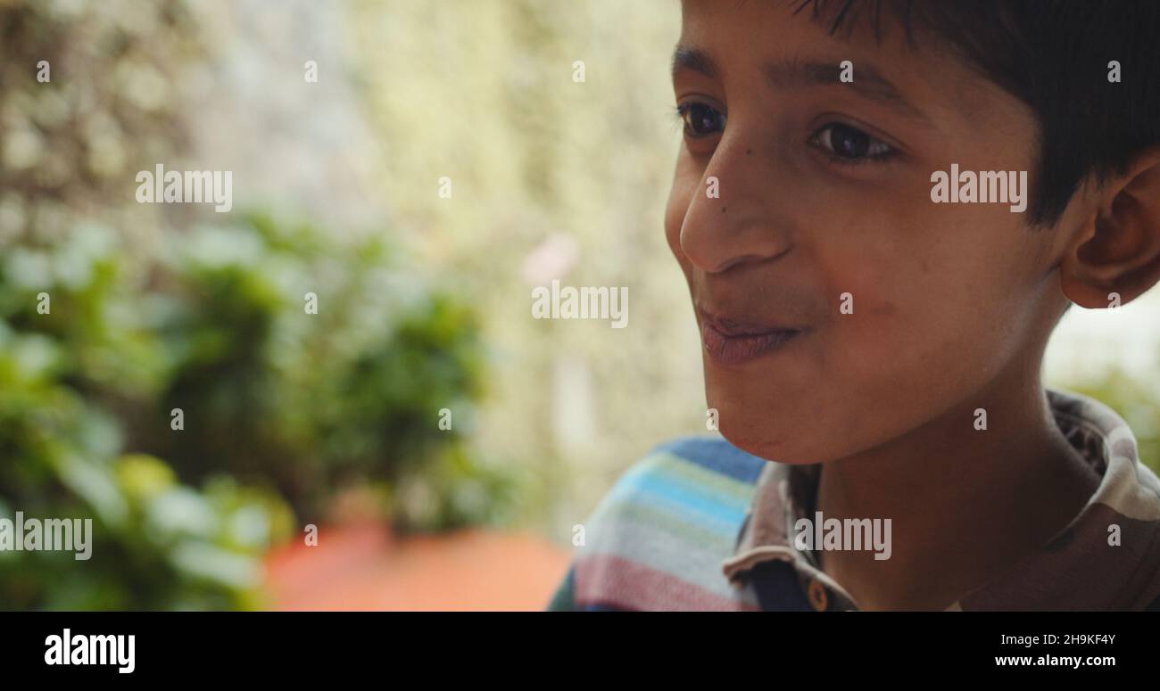 Shallow focus of a young Indian boy with a spontaneous smile Stock ...