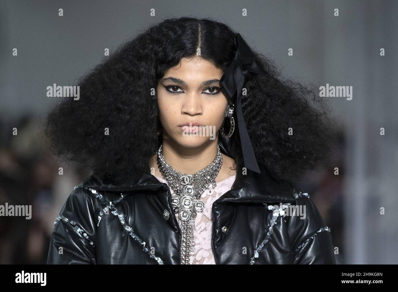 A model walks the runway during the Chanel Metiers D'Art 2021-2022 show ...