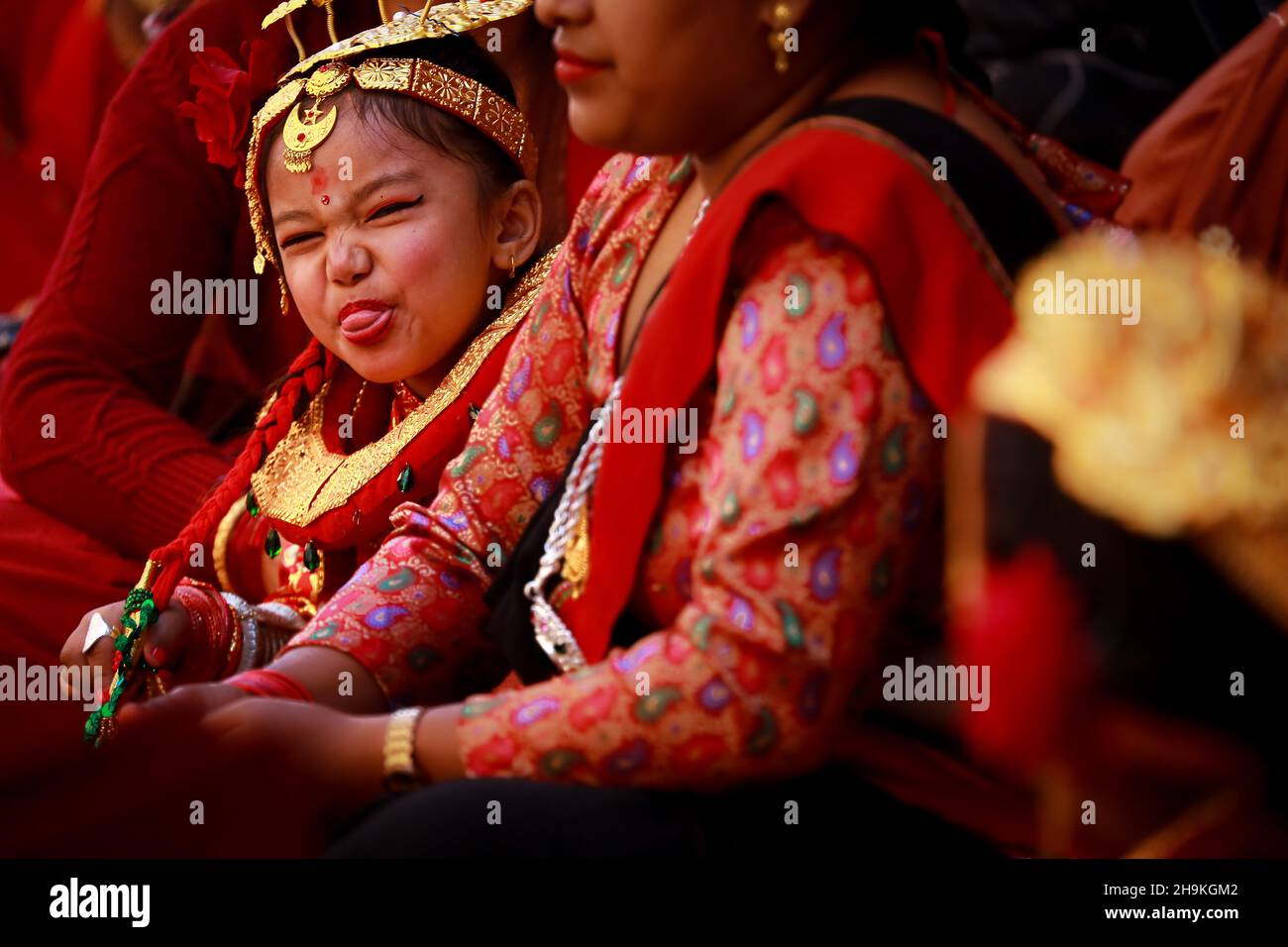 Bhaktapur, Bagmati, Nepal. 7th Dec, 2021. Girl in newari attire makes a ...
