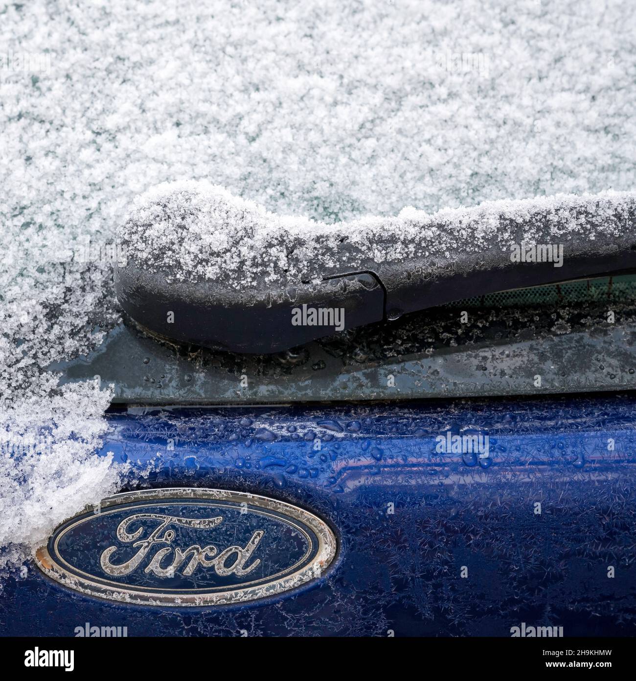 Flake snow on the rear window of Ford car Stock Photo - Alamy