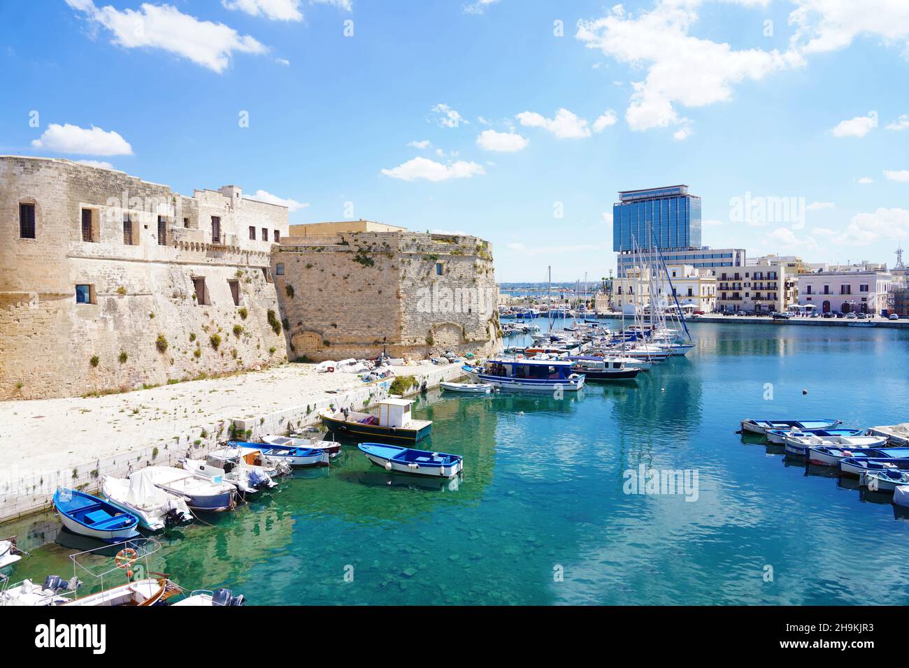 Old port of Gallipoli, view with castle and boats, Apulia, Italy Stock ...
