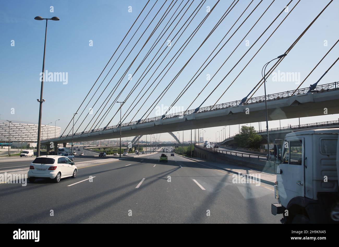 Azerbaijan Baku. 17.08.2021 : Highway asphalt road . Bridge a cable ...