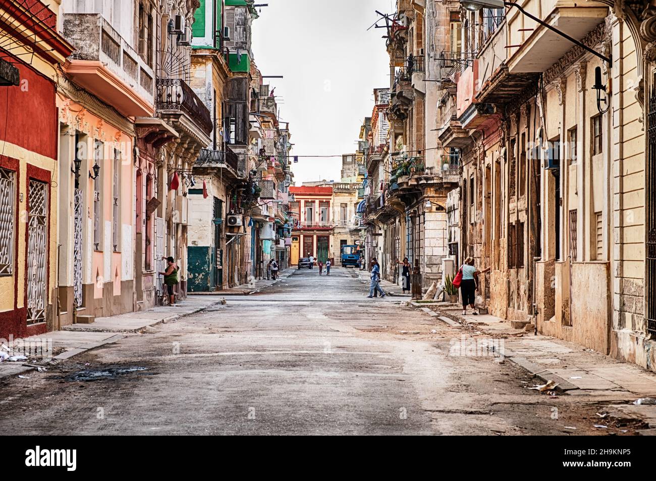 HAVANA, CUBA - DECEMBER 31, 2019: An almost empty street has just a ...