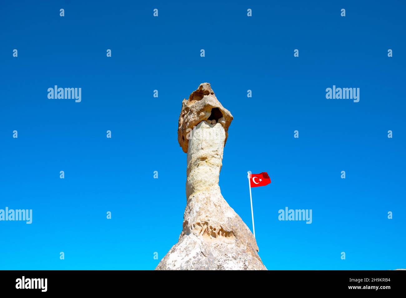 Fairy Chimney. Fairy Chimney or Hoodoo with Turkish flag in Cappadocia ...