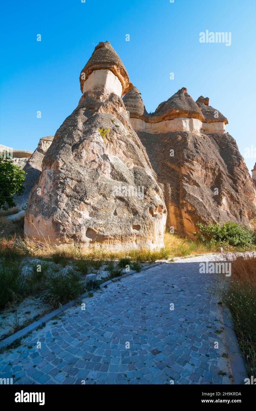 Fairy Chimneys. Fairy chimneys or hoodoos in Pasabagi. Walking path in ...