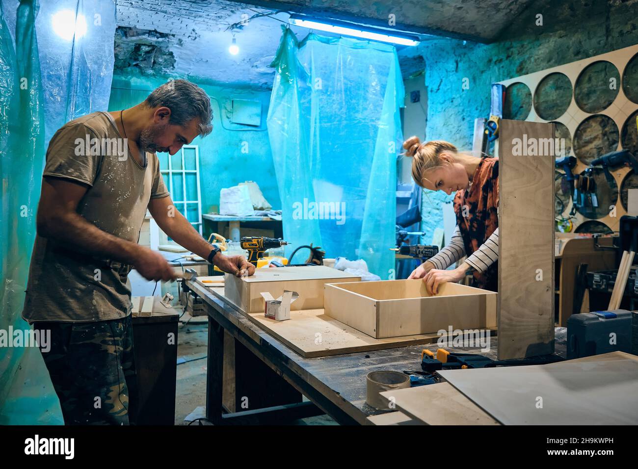 Working progress at carpenter workshop Stock Photo - Alamy