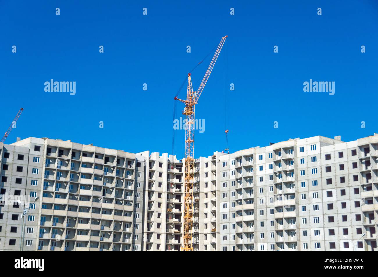 Lifting crane and construction work Stock Photo - Alamy