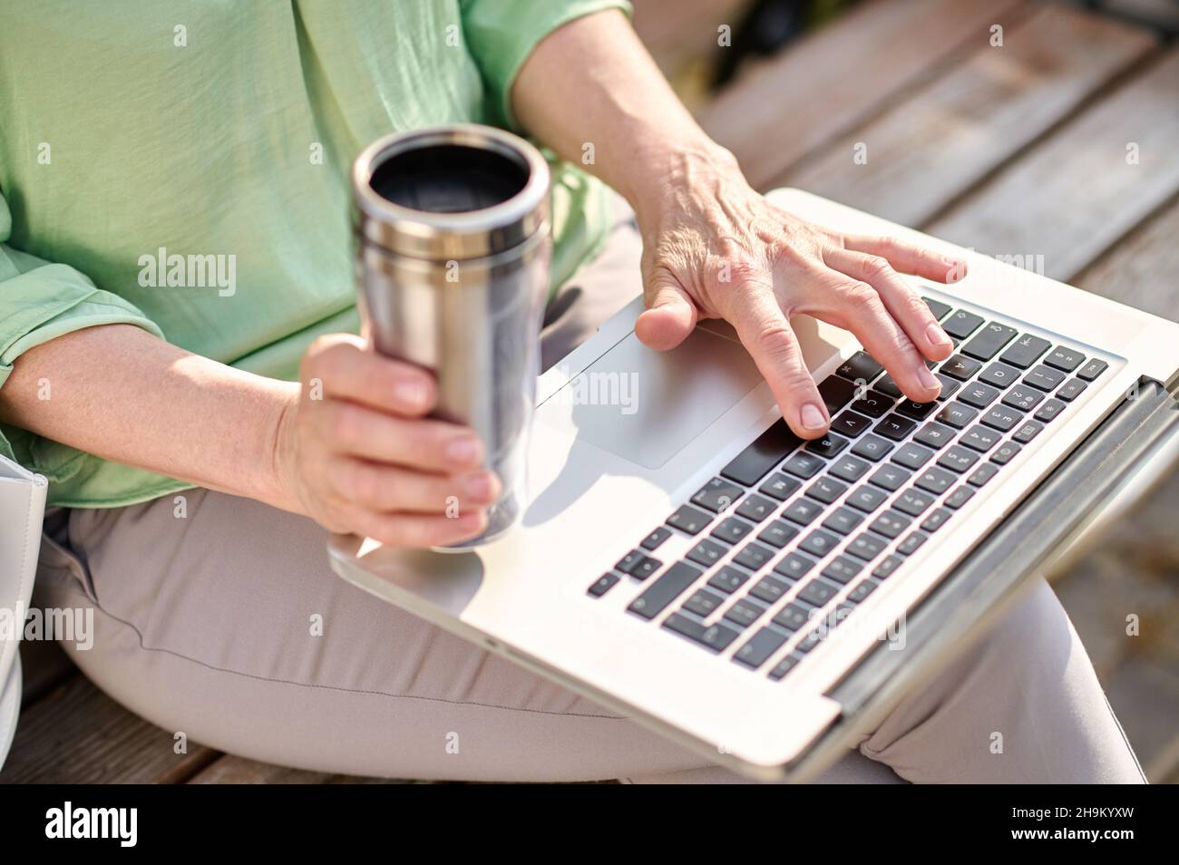 Hand over drink hi-res stock photography and images - Alamy