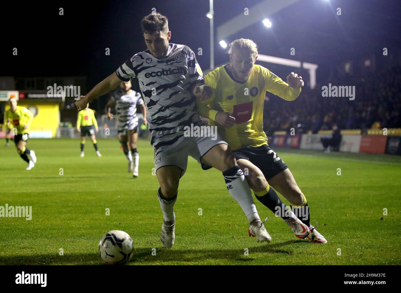 Forest Green's Jordan Moore-Taylor (left) and Harrogate Town's Luke ...