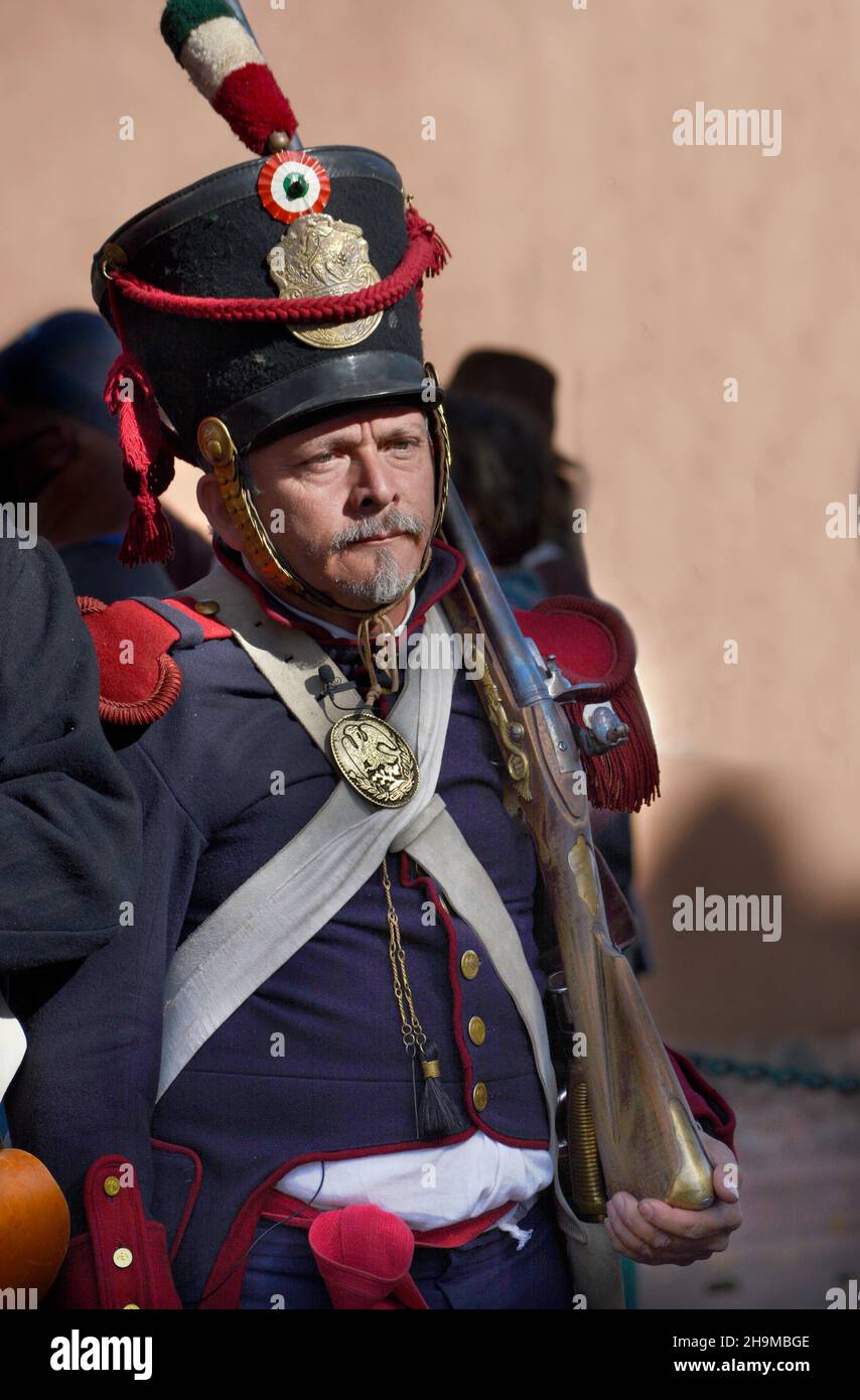 Reenactors in period Mexican infantry uniforms present a dramatic ...