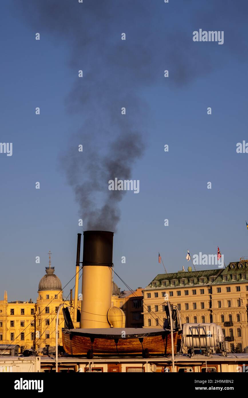 Air pollution in Stockholm. Chimney of boat with black smoke coming out ...