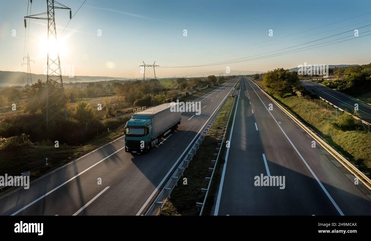 Big Lorry Truck on a rural countryside highway. Business Transportation ...
