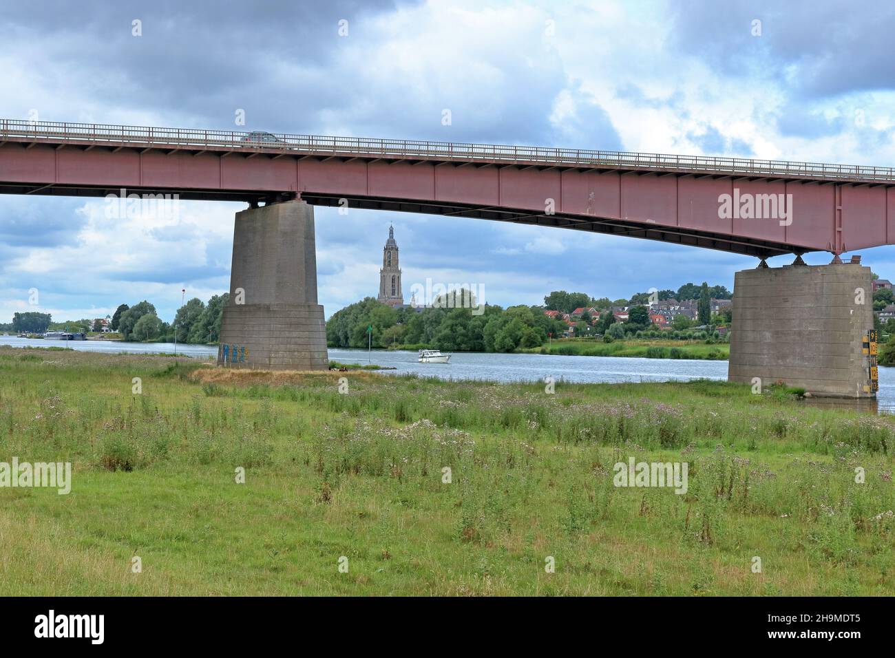 Highway bridge in front of Rhenen church tower Stock Photo - Alamy