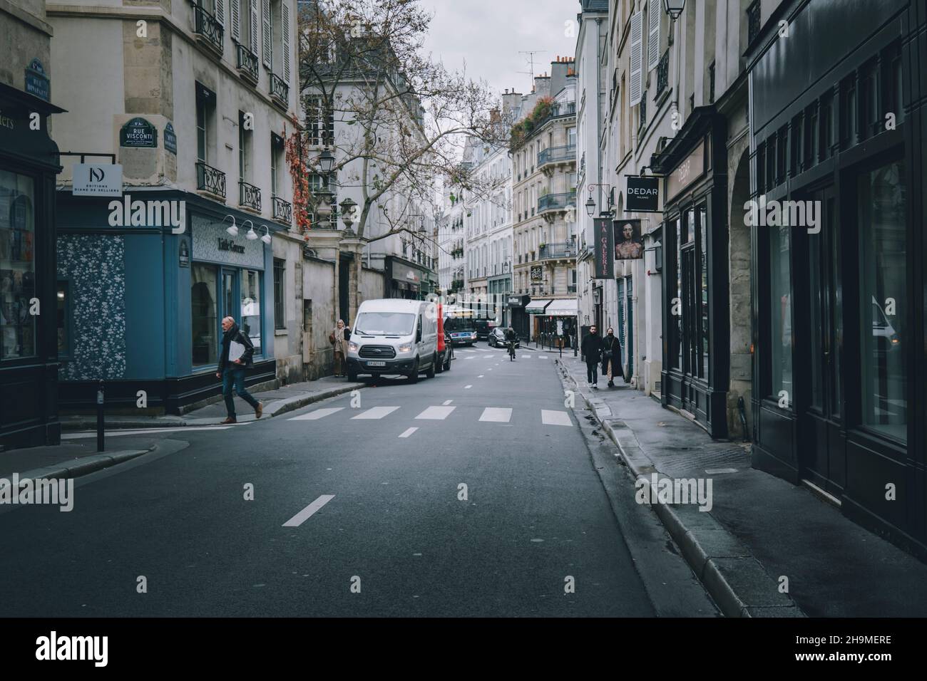 Street scene at the streets fo Paris and people walking around. Paris ...