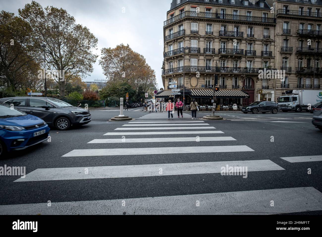 Street scene at the streets fo Paris and people walking around. Paris ...